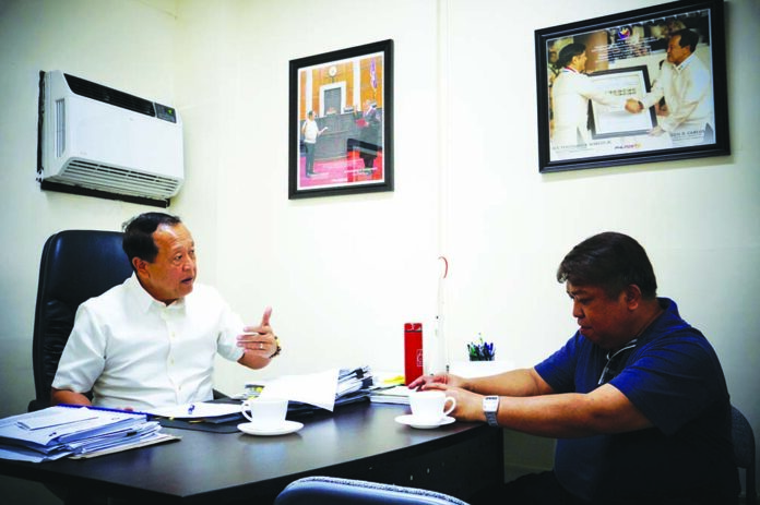 Postmaster General and Chief Executive Officer Luis D. Carlos & the ...