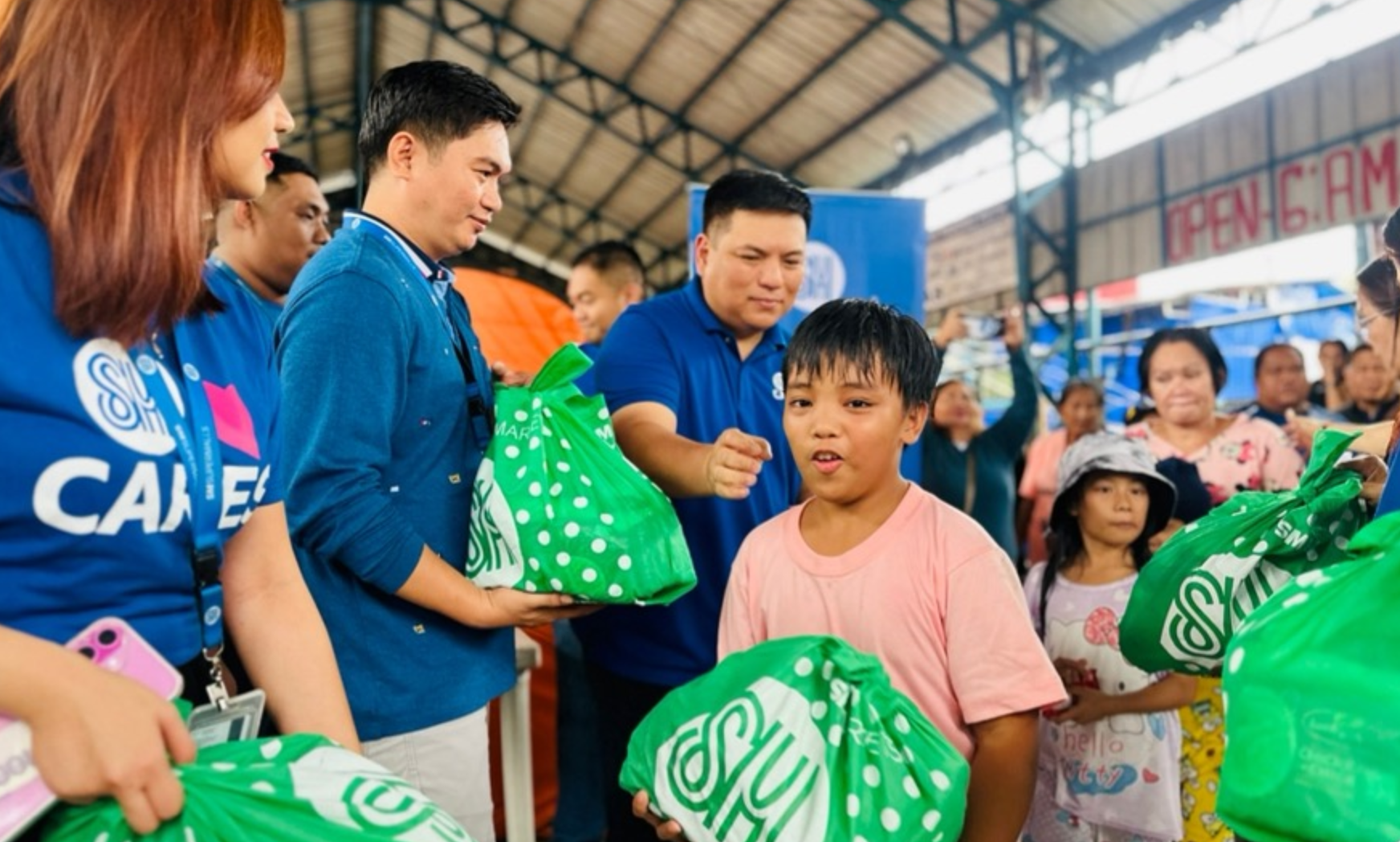 SM Group ramps up aid to families affected by monsoon rains, typhoons ...